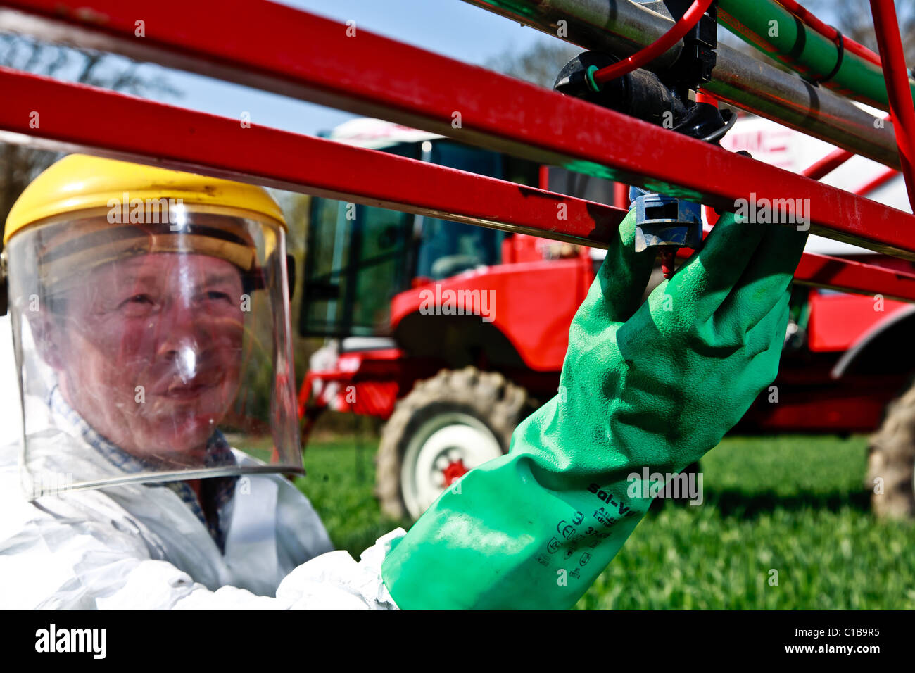 Checking the nossels on a sprayer Stock Photo - Alamy