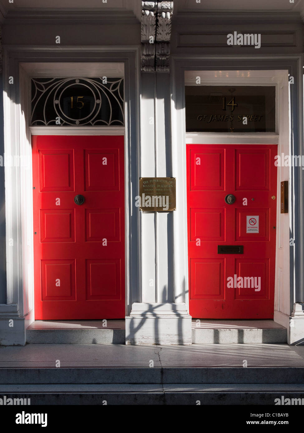 Two Red Doors Stock Photo - Alamy