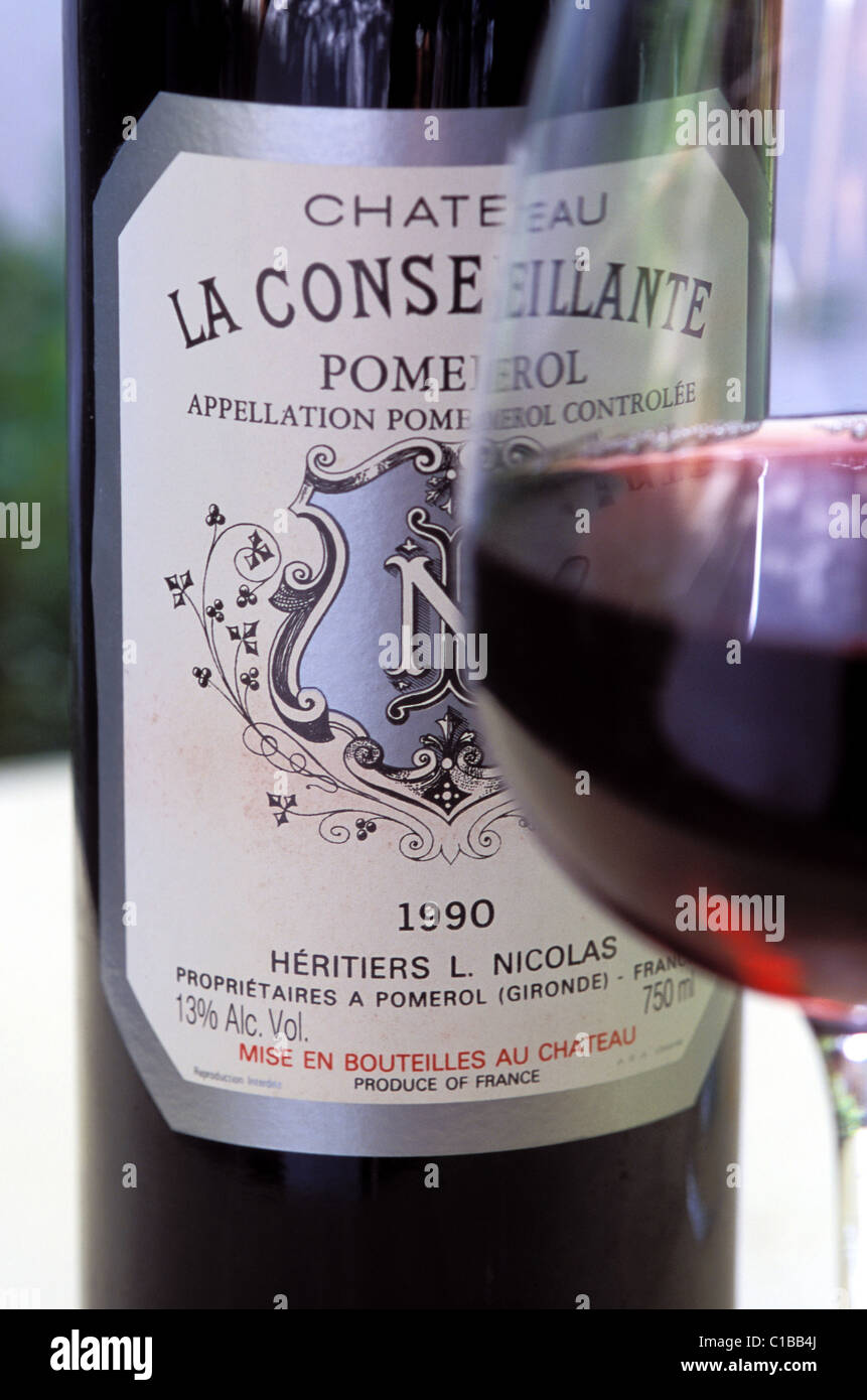 France, Gironde, tasting a glass of Pomerol (vineyard of Bordeaux Stock ...