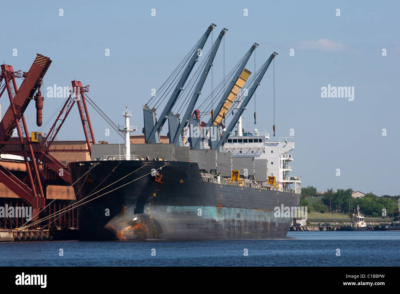 Cargo ship at pier hi-res stock photography and images - Alamy