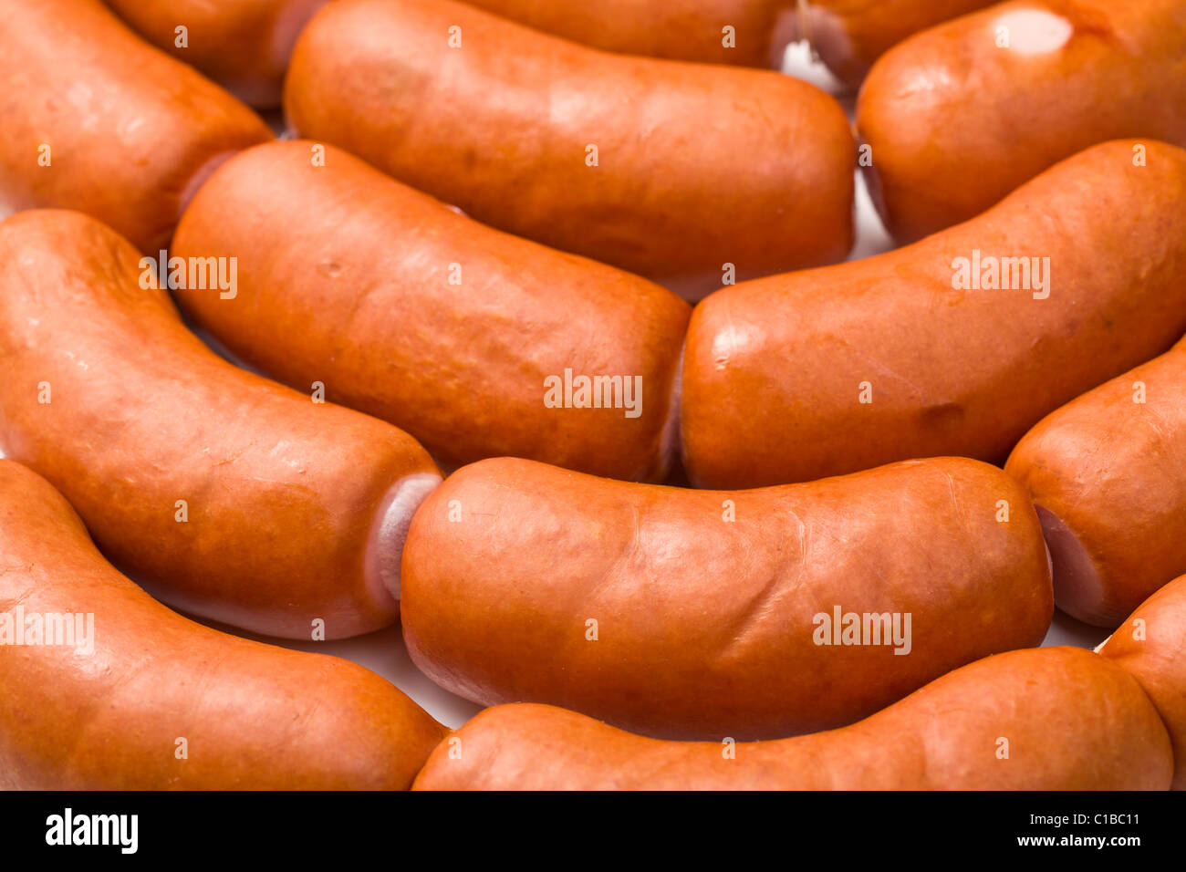 raw sausages background Stock Photo - Alamy