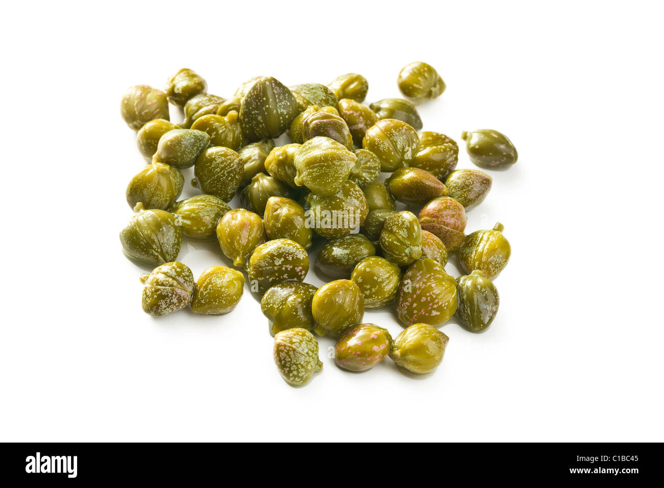 green capers on white background Stock Photo - Alamy
