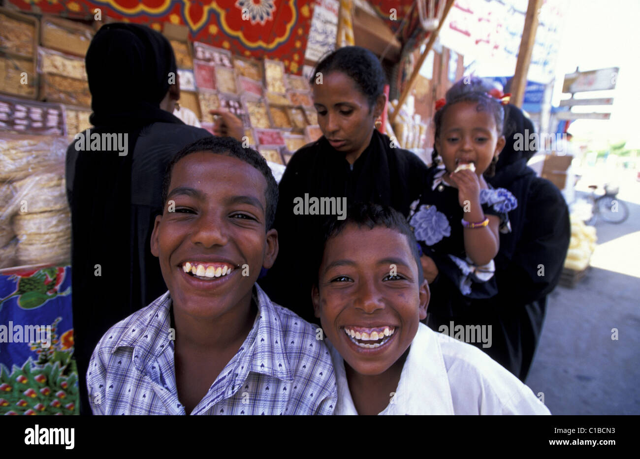 Egypt, Aswan, Portrait of two children and their families Stock Photo ...
