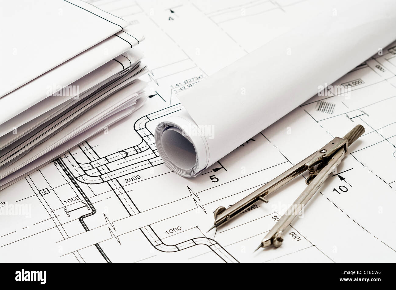 Project black and white blueprints and measurement tools on it. Russian ...