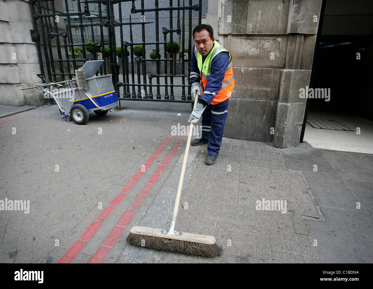 A road sweeper in London clean the streets near to Victoria station ...