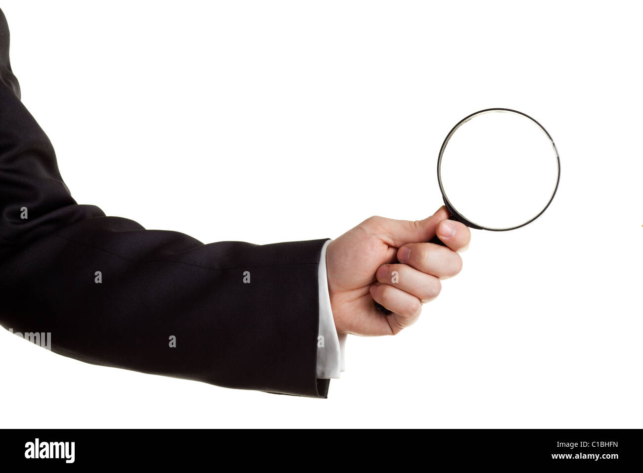 Hand holding a magnifying glass isolated on white Stock Photo - Alamy