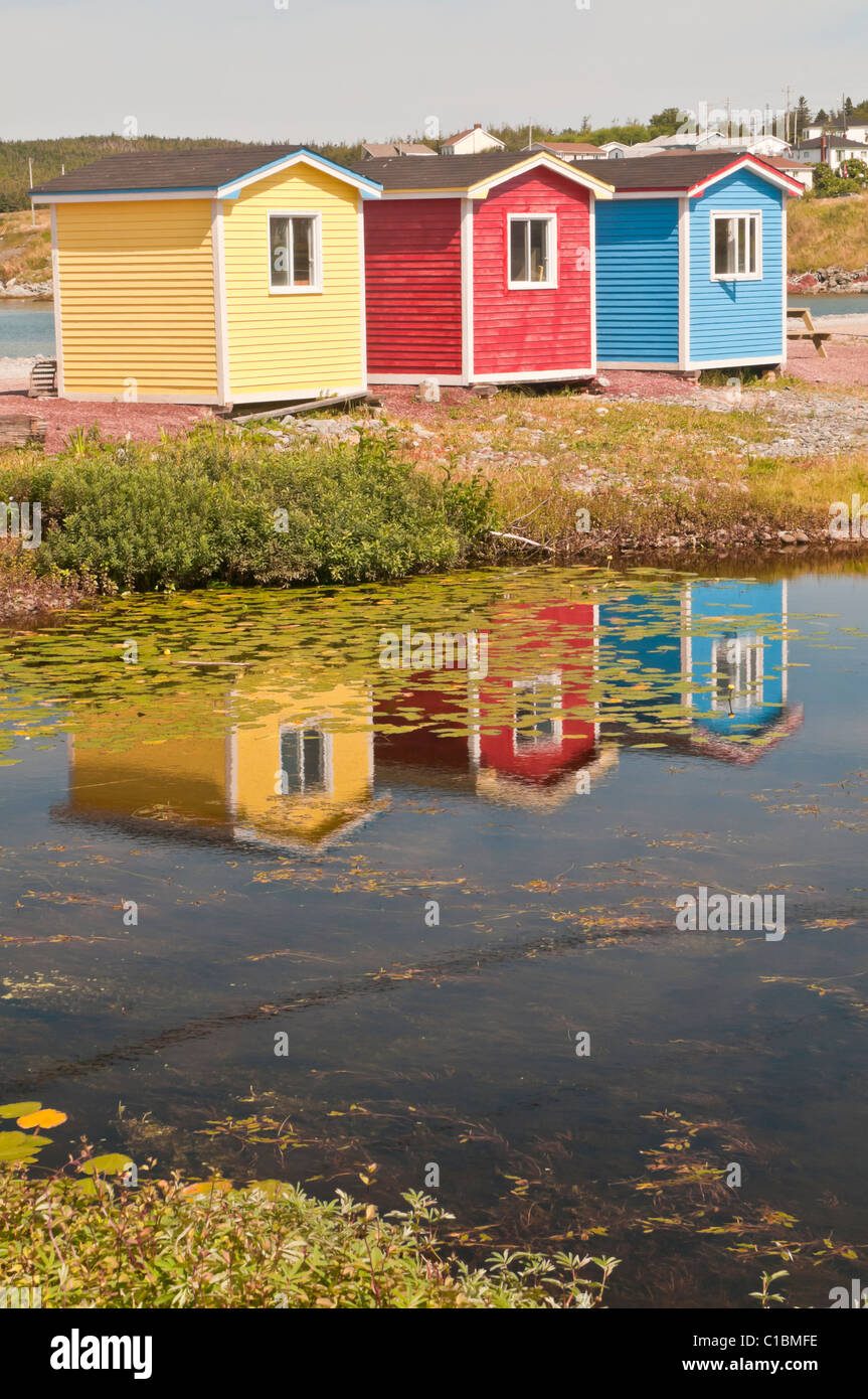 Colorful beach huts reflected in a pond, Cavendish, Trinity Bay, Avalon ...