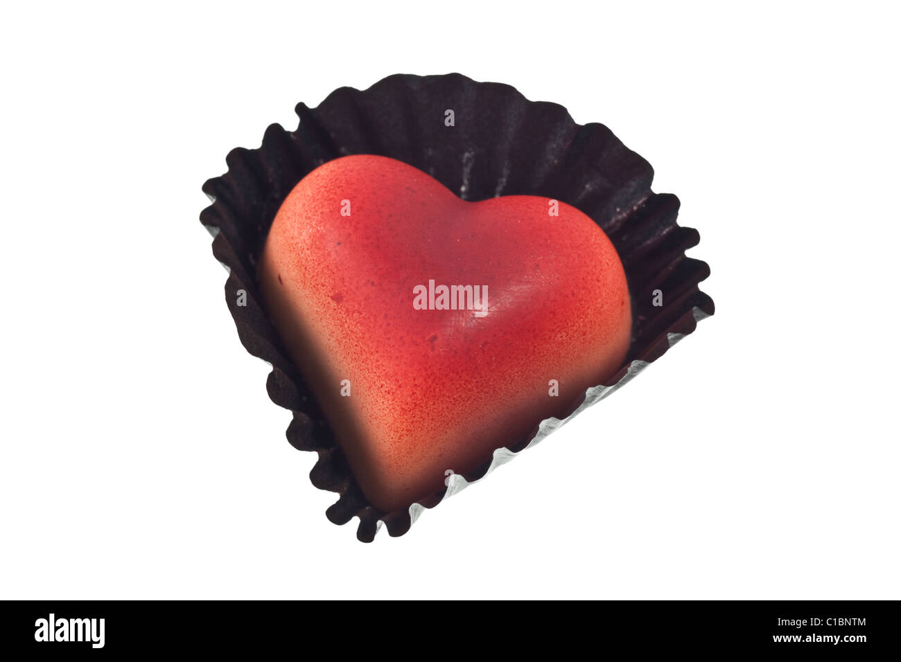 Heart shape chocolate in a wrapper isolated on white background Stock ...