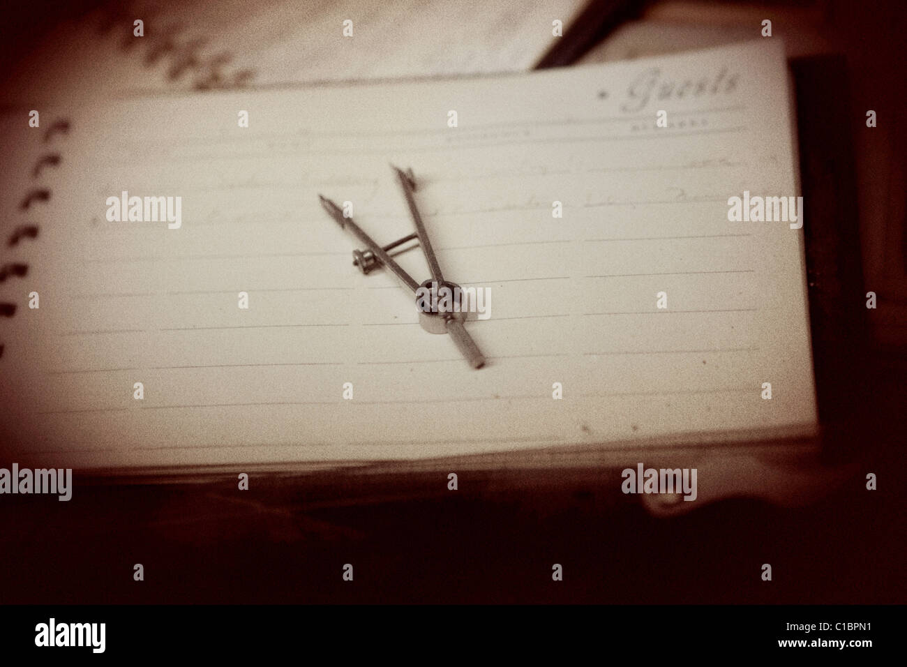 OLD COMPASS TOOL DRAWING VINTAGE PAPER DRAW PHOTOGRAPH Stock Photo - Alamy