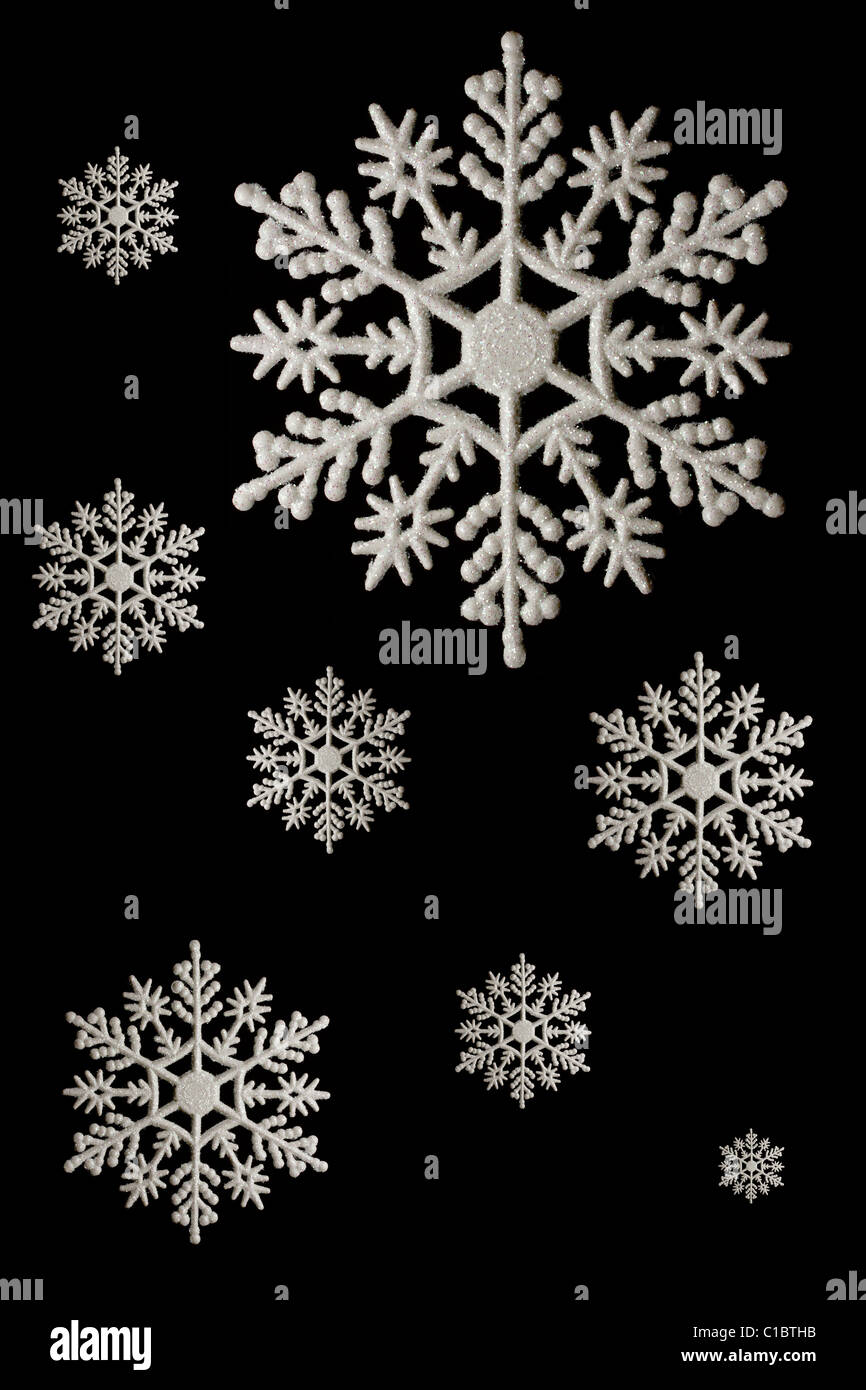 Snowflakes on black background Stock Photo - Alamy
