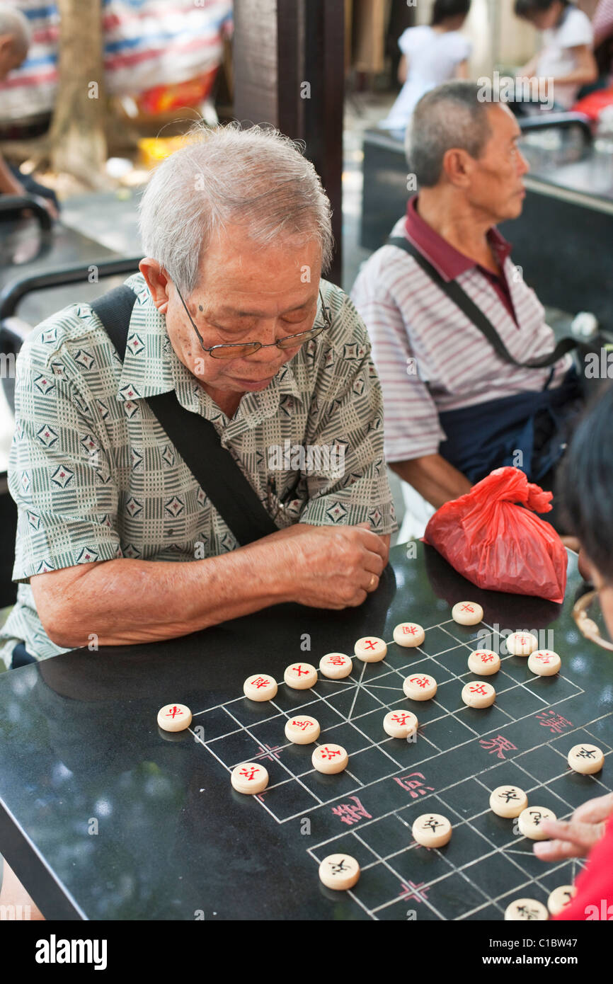 Men playing Xiangqi (Chinese chess) in Chinatown, Singapore Stock Photo ...