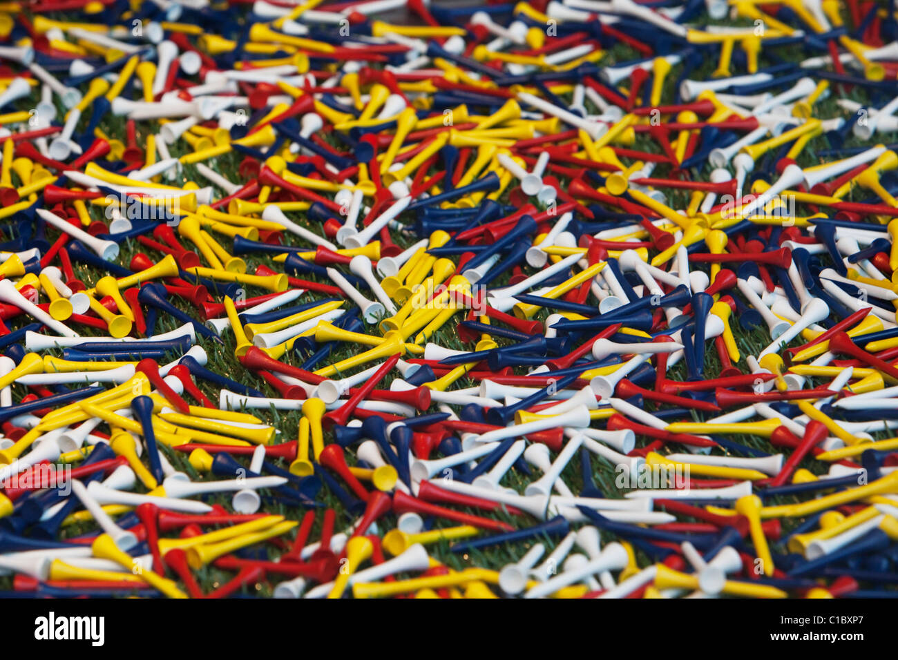 Multi coloured golf tees Stock Photo - Alamy