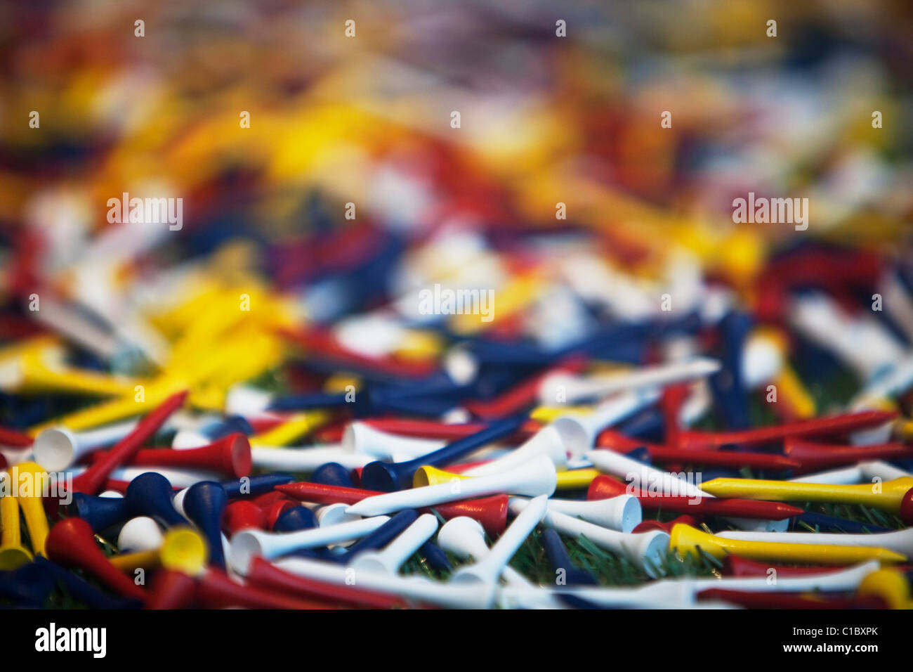 Multi coloured golf tees Stock Photo - Alamy