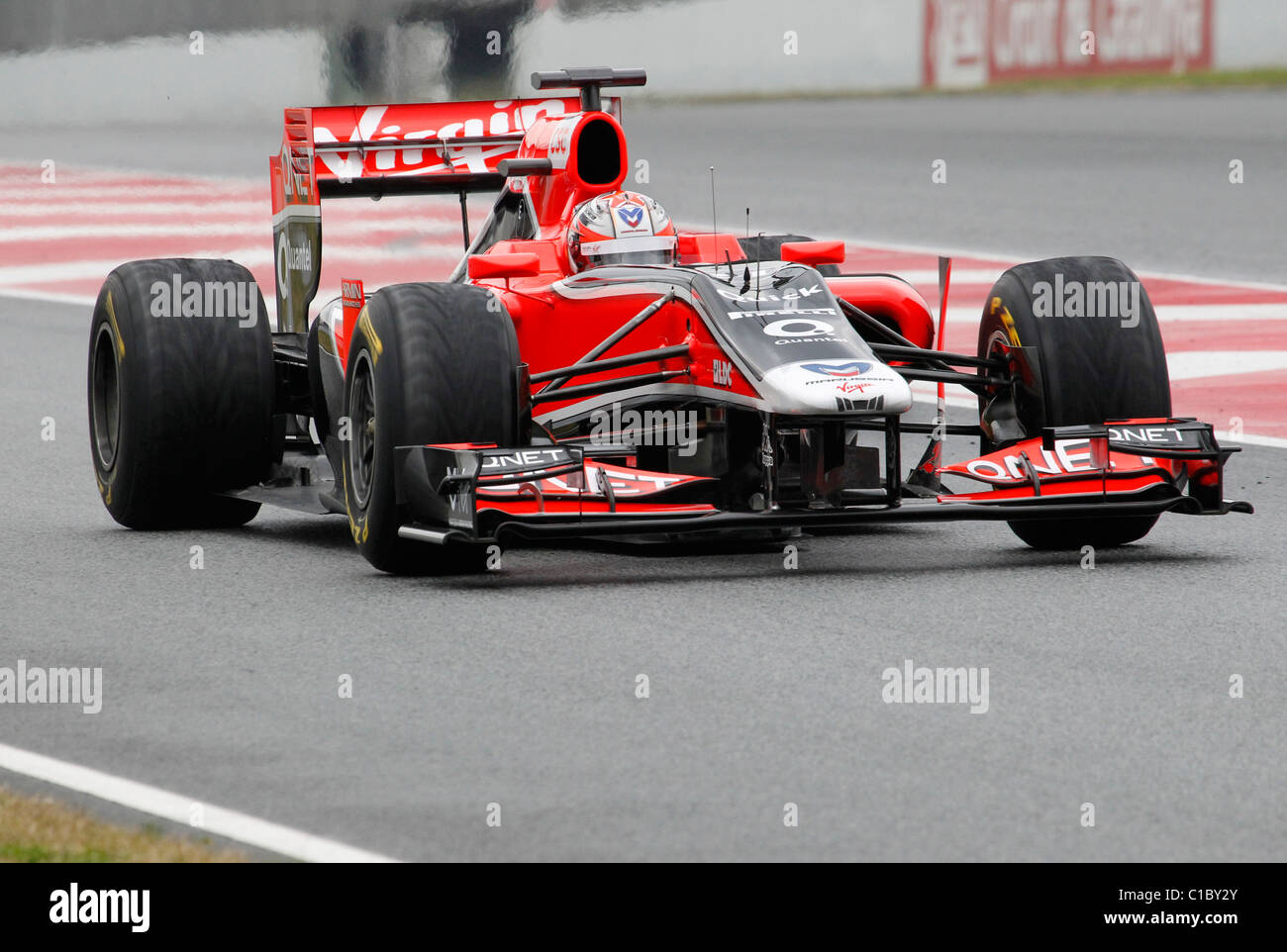 Formula One Virgin racing driver Timo Glock exiting the pit lane at ...