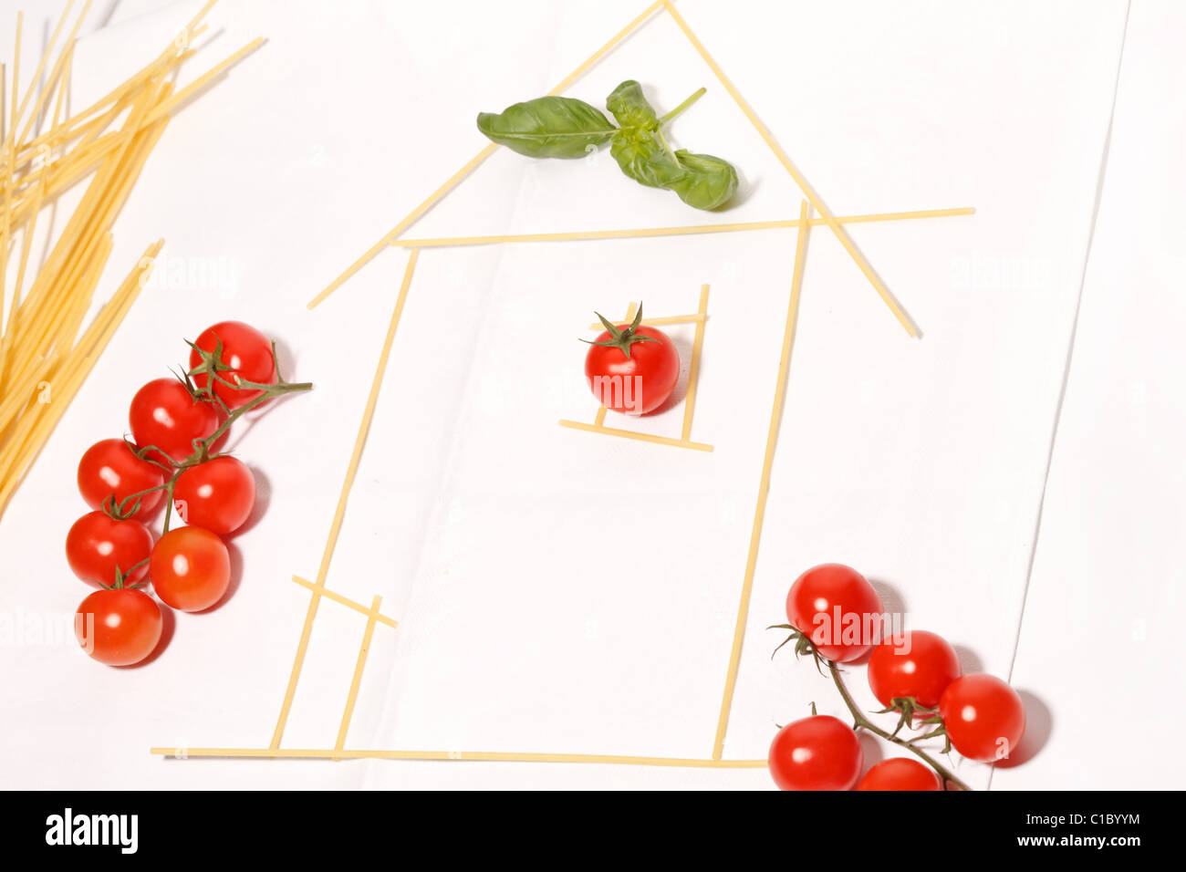 house from pasta, tomato and basil Stock Photo - Alamy