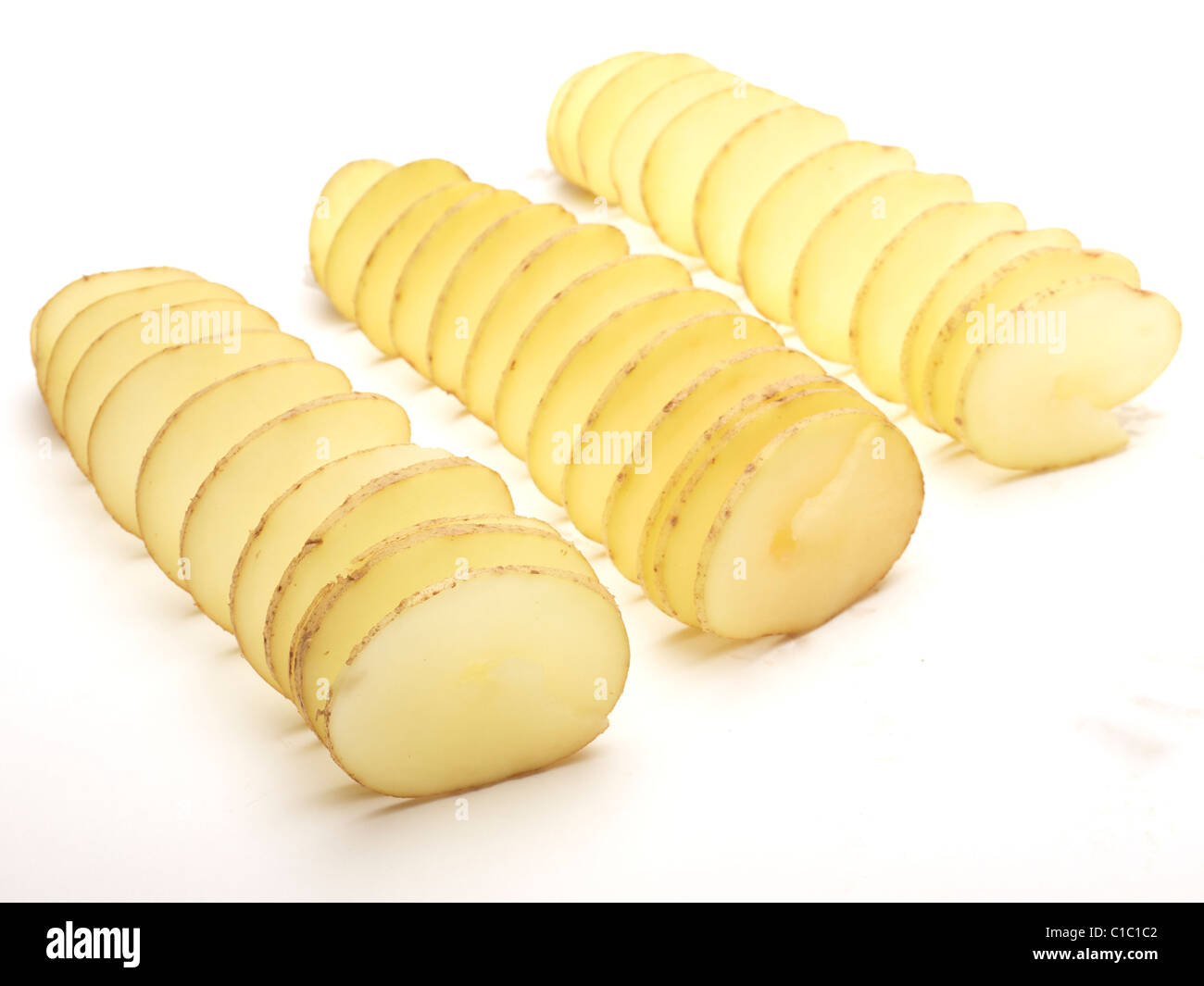 Raw potatoes cut in a spiral Stock Photo - Alamy