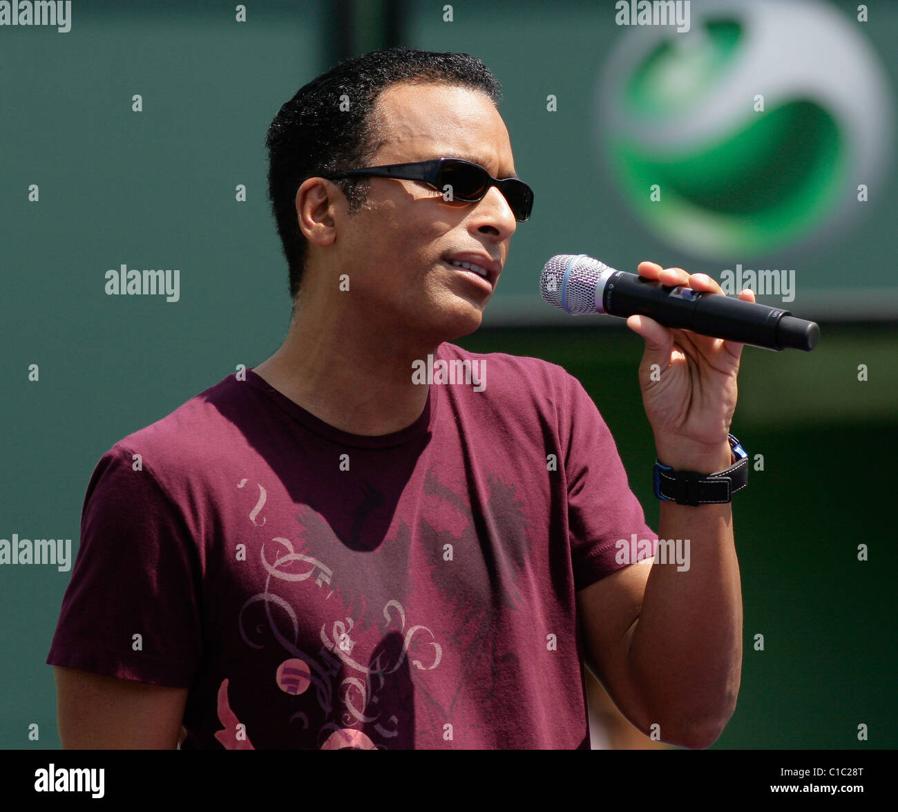 Singer Jon Secada performs the National Anthem before the men's final ...