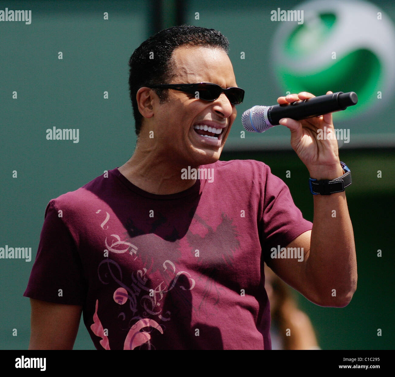 Singer Jon Secada performs the National Anthem before the men's final ...