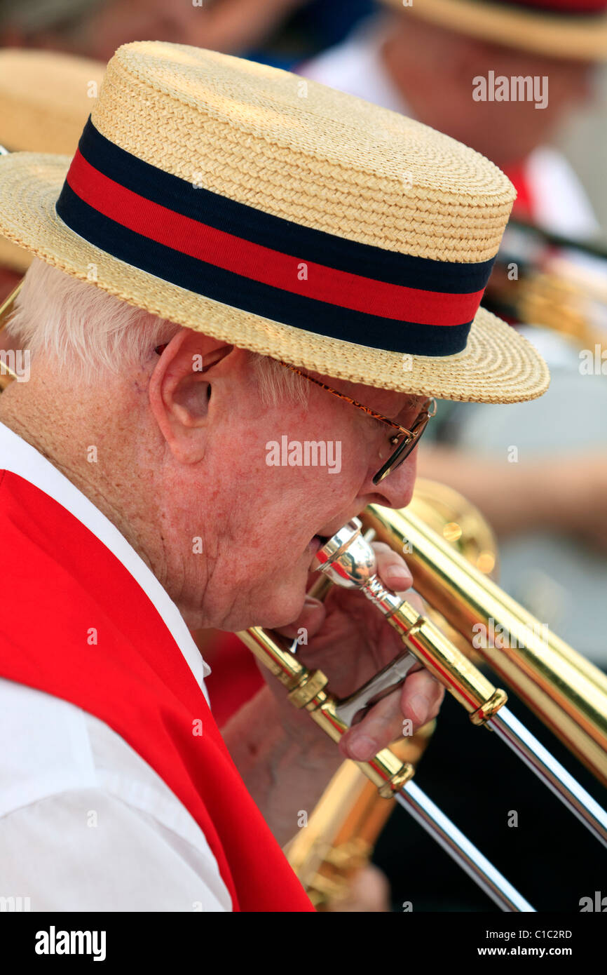 Man playing trombone at an outdoors concert Stock Photo - Alamy