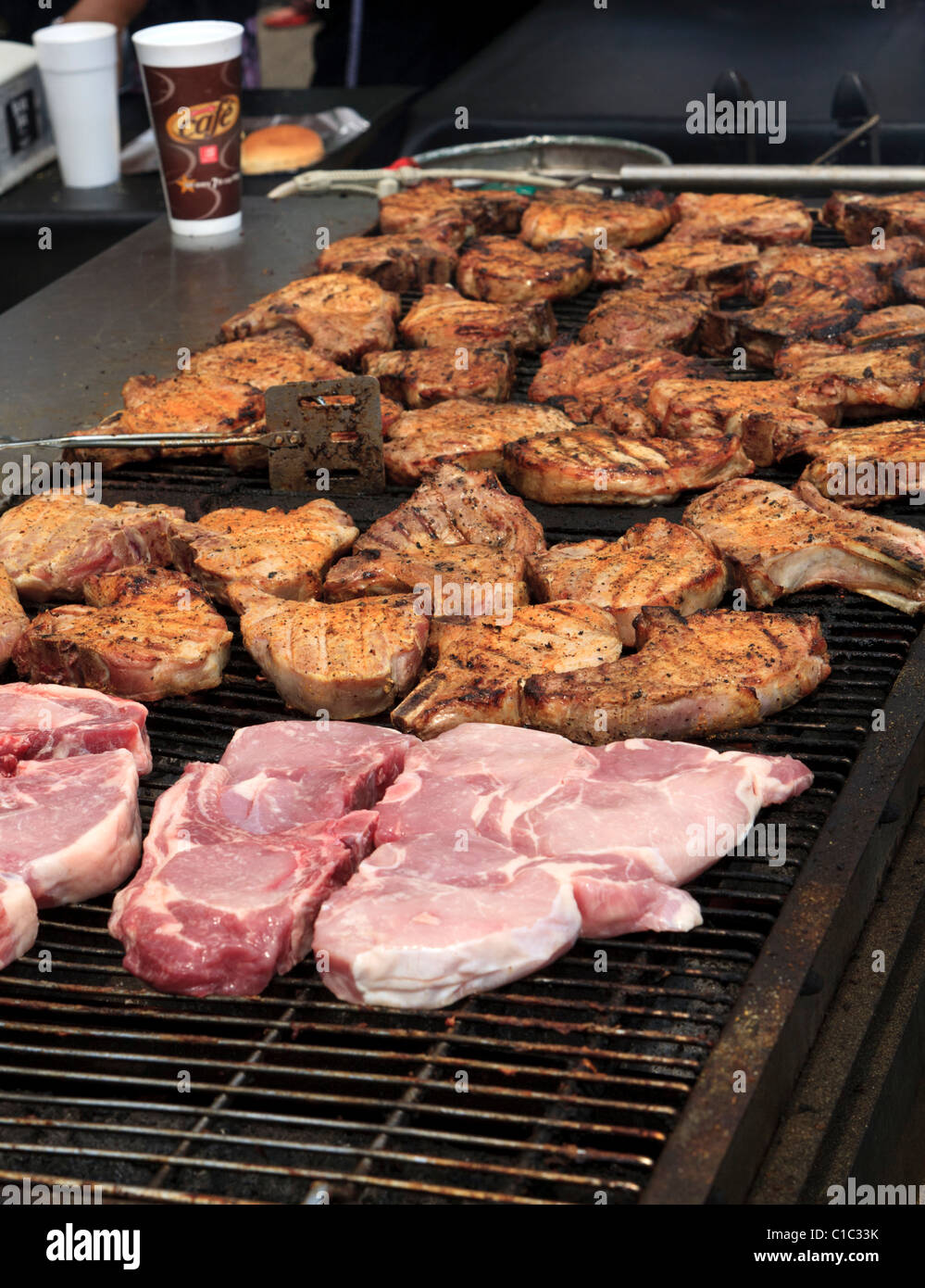 Cooking meat on a grill hi-res stock photography and images - Alamy