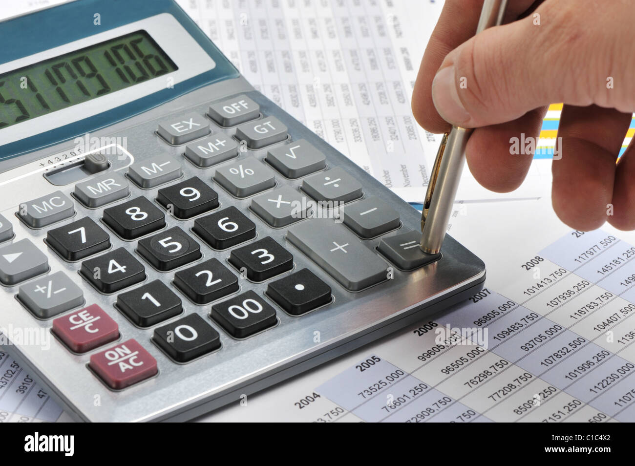 Calculator and finger pressing button hi-res stock photography and ...