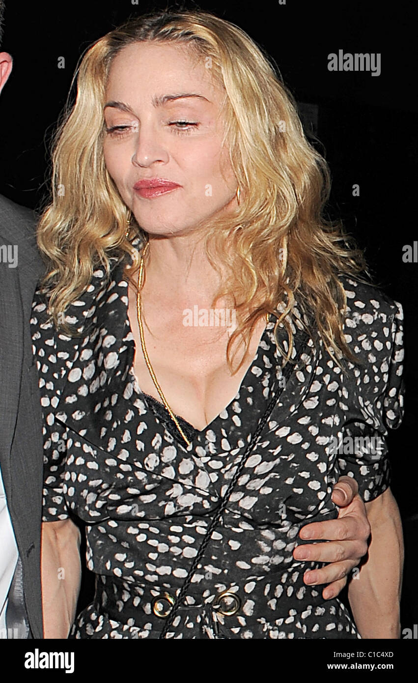 Madonna is all smiles as she arrives at Cecconi's restaurant in Mayfair ...
