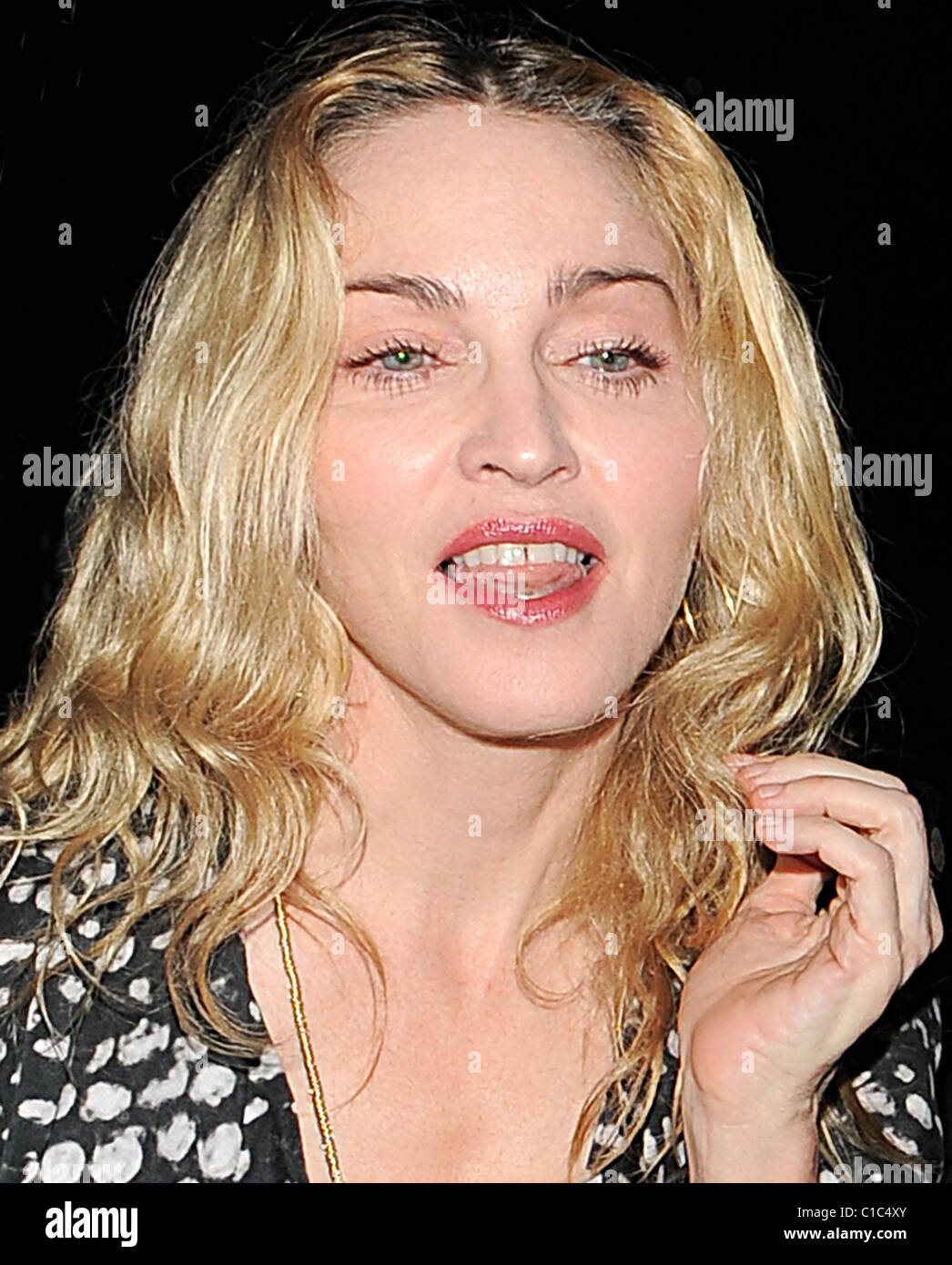 Madonna is all smiles as she arrives at Cecconi's restaurant in Mayfair ...