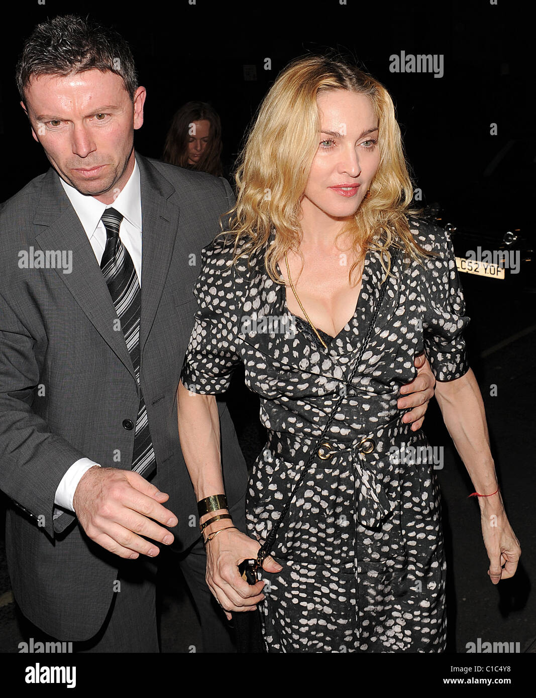 Madonna is all smiles as she arrives at Cecconi's restaurant in Mayfair ...