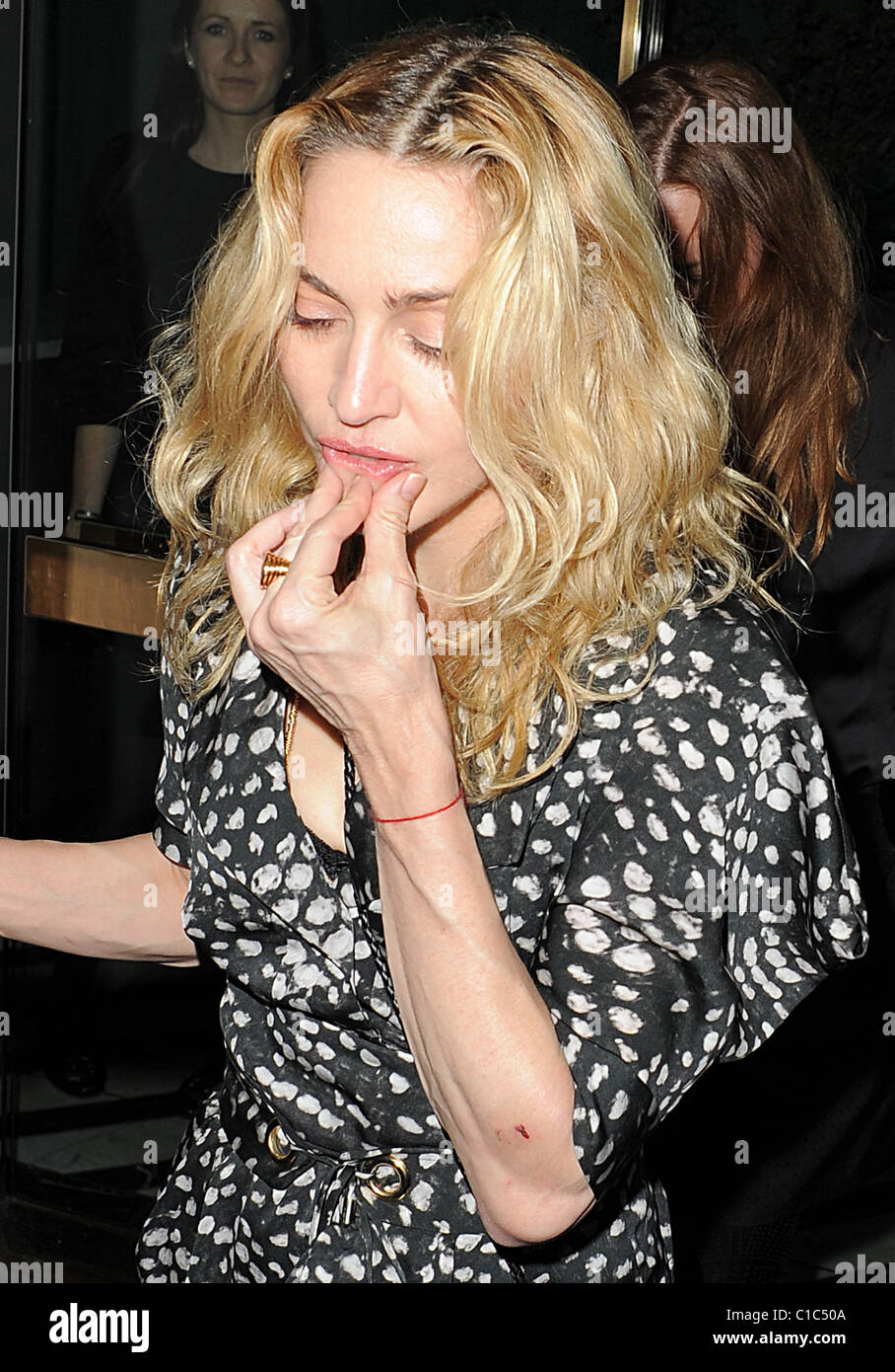 Madonna is all smiles as she arrives at Cecconi's restaurant in Mayfair ...
