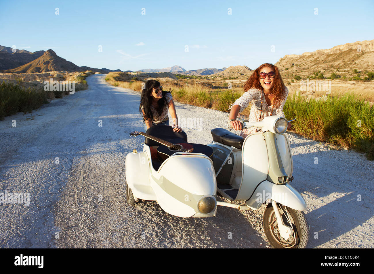 Pushing motorbike hi-res stock photography and images - Alamy