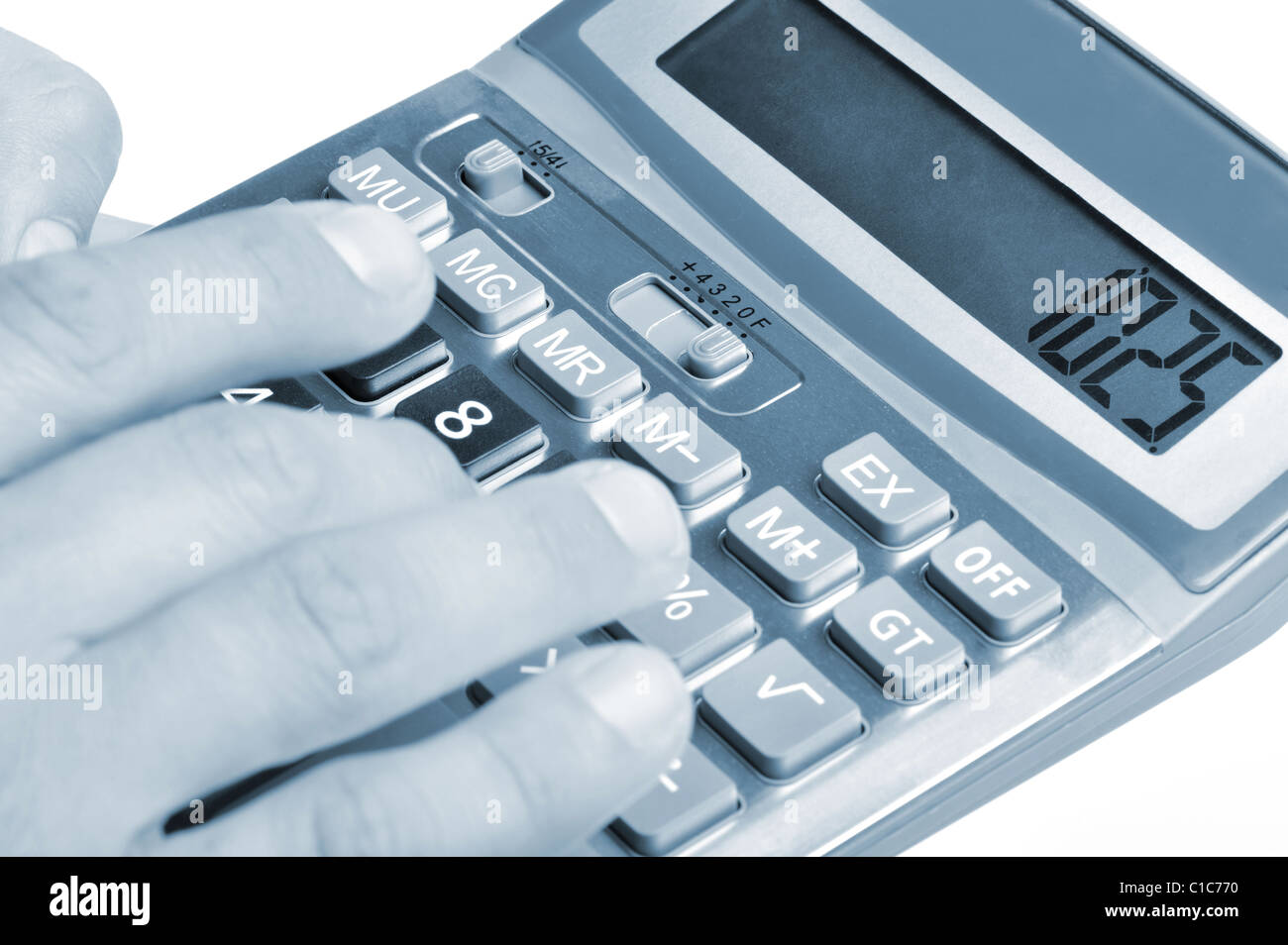 The calculator and a hand of the man. Pressing of a key of the ...