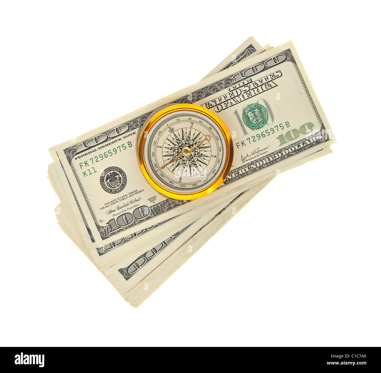 Dollars and compass. Concept about a direction in business Stock Photo ...