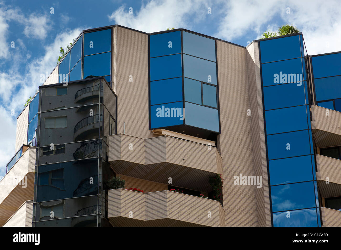 Modern angular glass and brick building in Monaco Stock Photo - Alamy