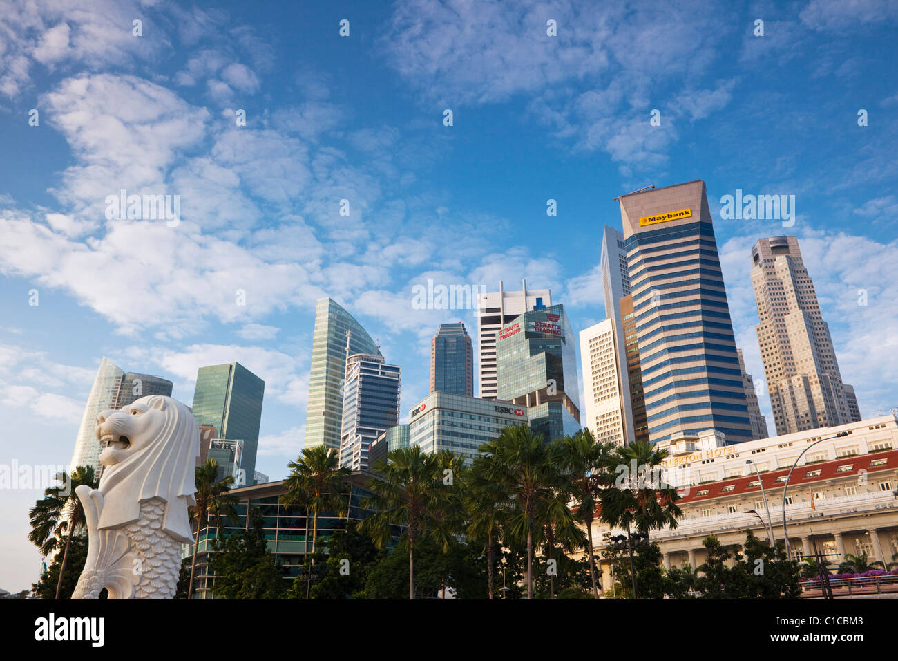 The Merlion Statue with the city skyline in the background, Marina Bay ...