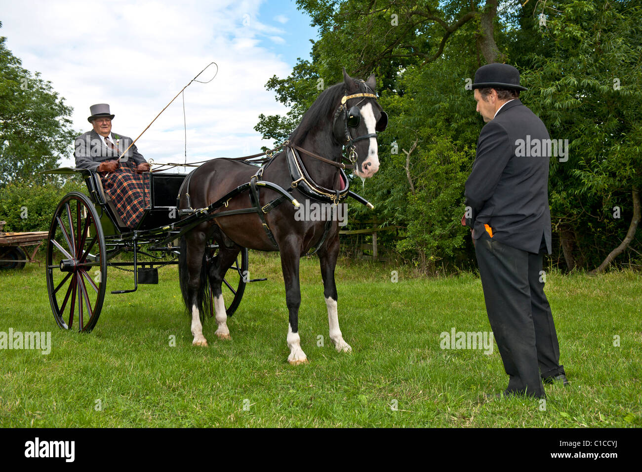 Horse and carriage drivers Stock Photo - Alamy