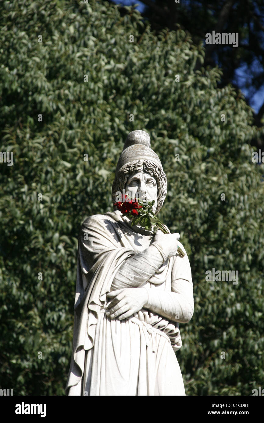 statue with red rose in piazza del popolo square in rome Stock Photo ...