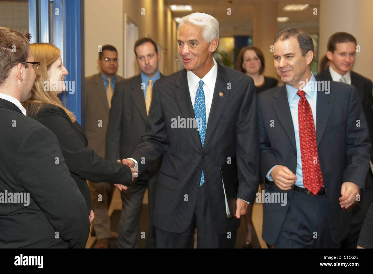 Florida Governor Charlie Crist center, and Chairman and CEO of Kaplan ...