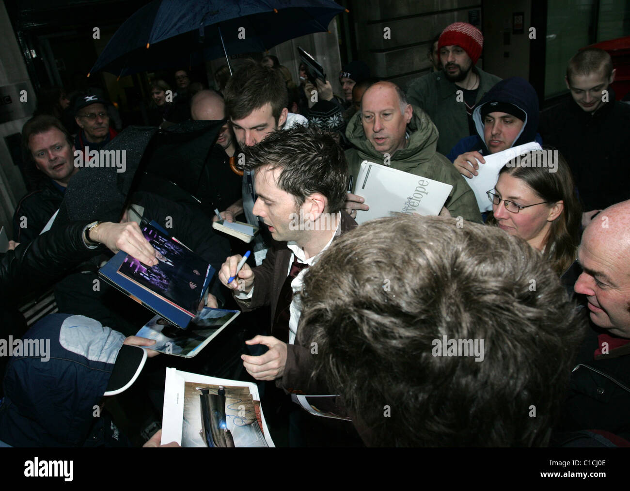 David Tennant is mobbed by fans as he arrives at the BBC Radio 2 ...