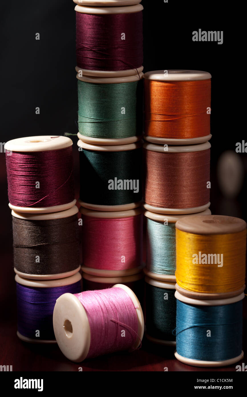 cotton reels of different colors colours Stock Photo - Alamy