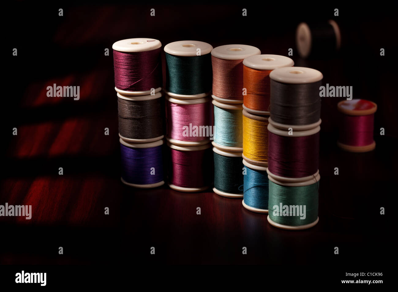 cotton reels of different colors colours Stock Photo - Alamy