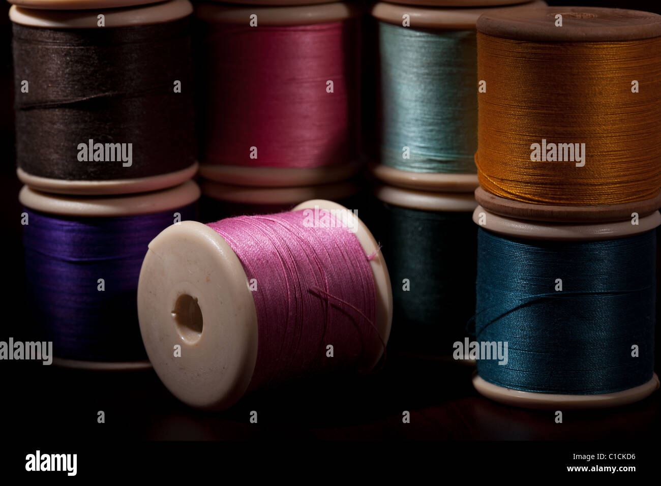 cotton reels of different colors colours Stock Photo - Alamy