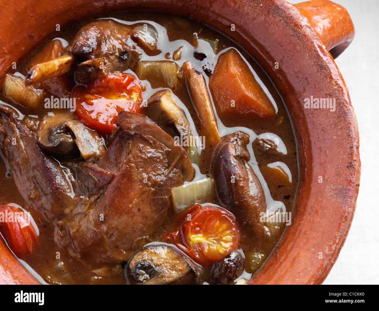 A rustic pot of rabbit stew traditional comfort main meals Stock Photo ...