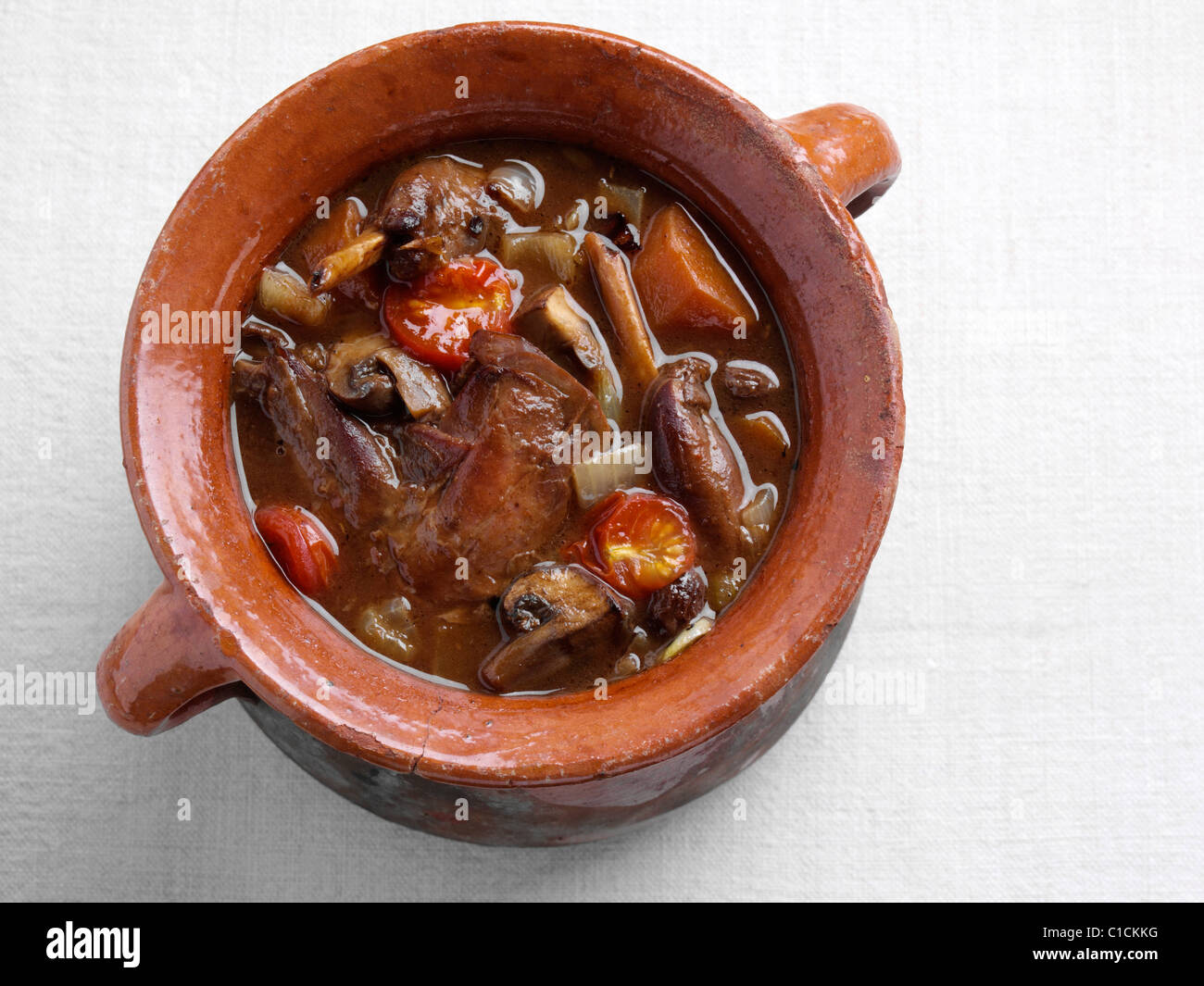 A rustic pot of rabbit stew traditional comfort main meals Stock Photo ...