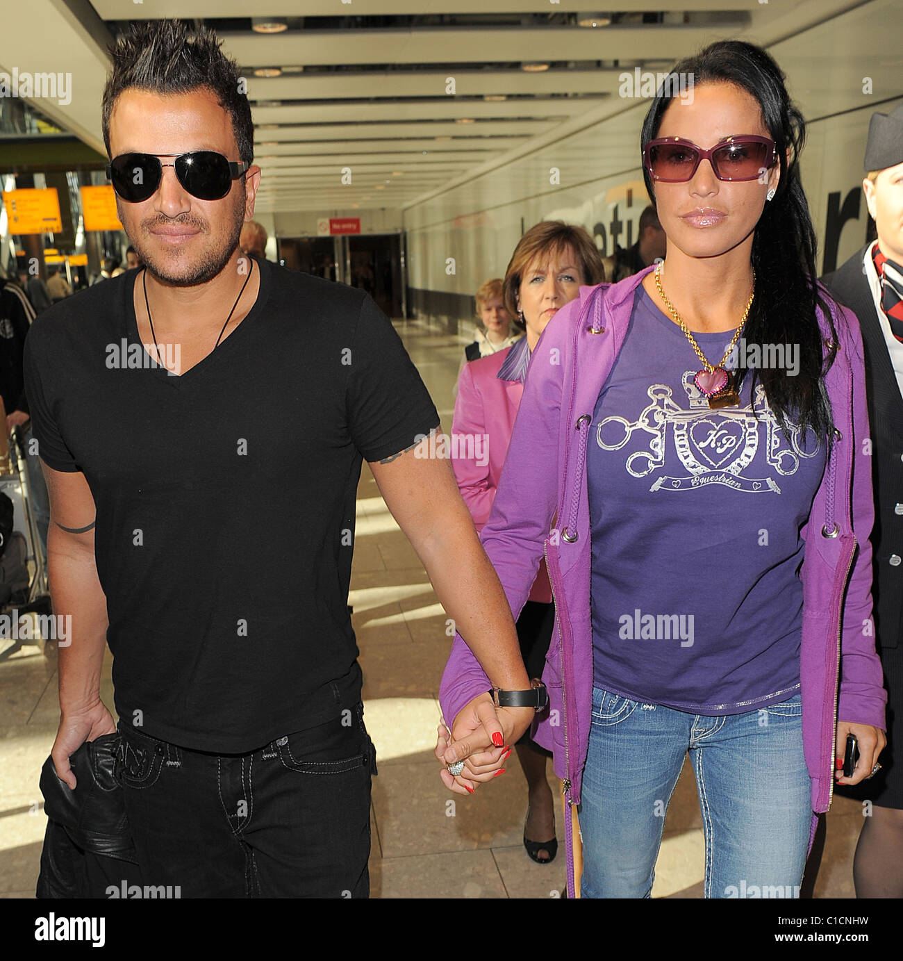 Peter Andre and his wife Katie Price aka Jordan arrive at Heathrow ...