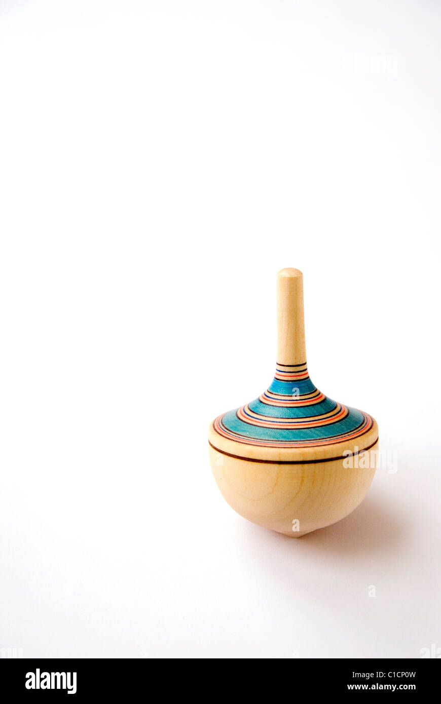 Wooden toy whirligig isolated on a white background Stock Photo - Alamy