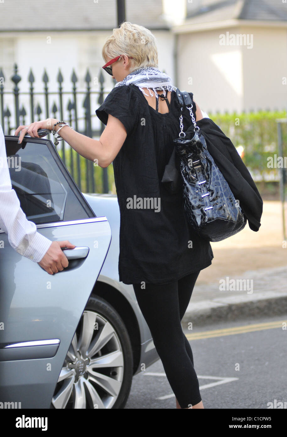 Girls Aloud singer Sarah Harding leaving home wearing a stylish pair of ...