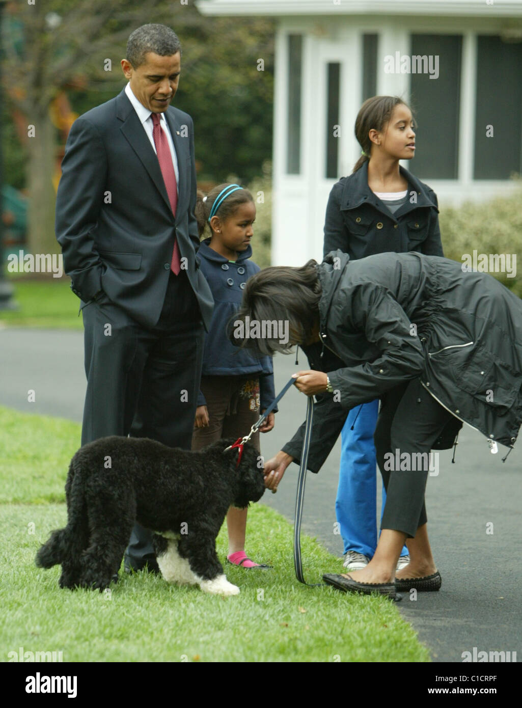 Malia Obama walks her new six-month old Portuguese water dog Bo ...