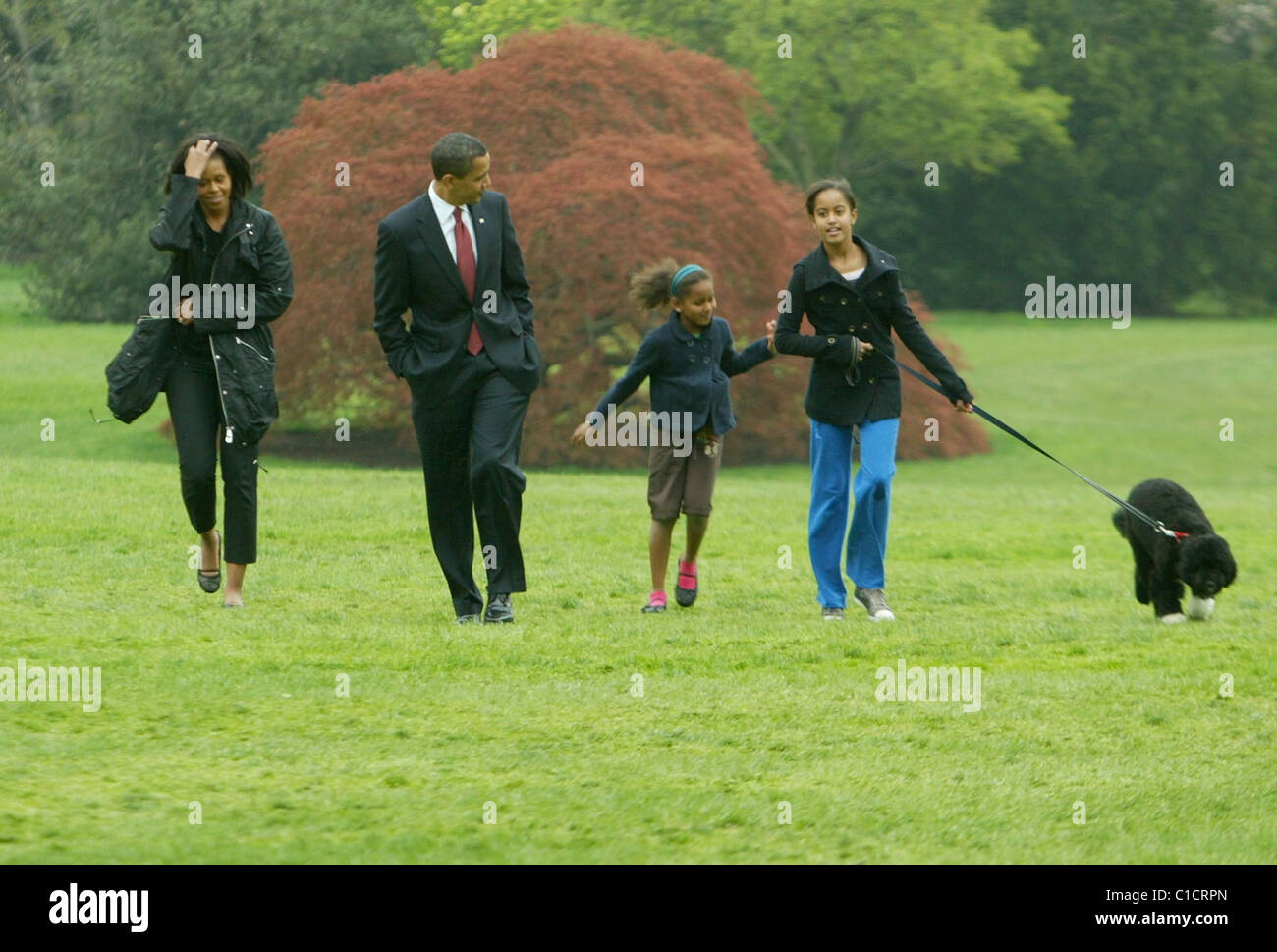Malia Obama walks her new six-month old Portuguese water dog Bo ...