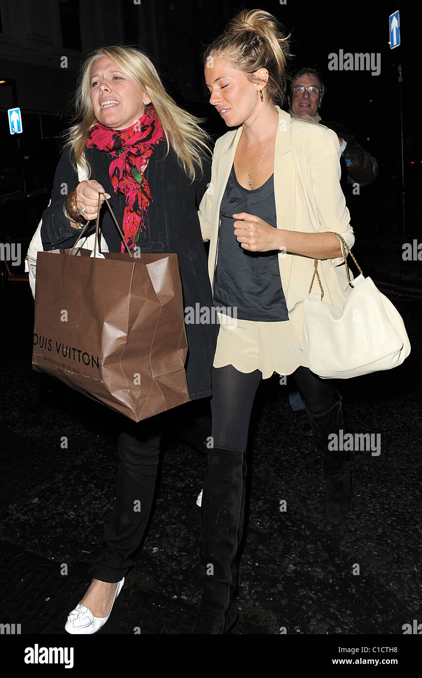 Sienna Miller and a female friend appear in high spirits as they leave ...