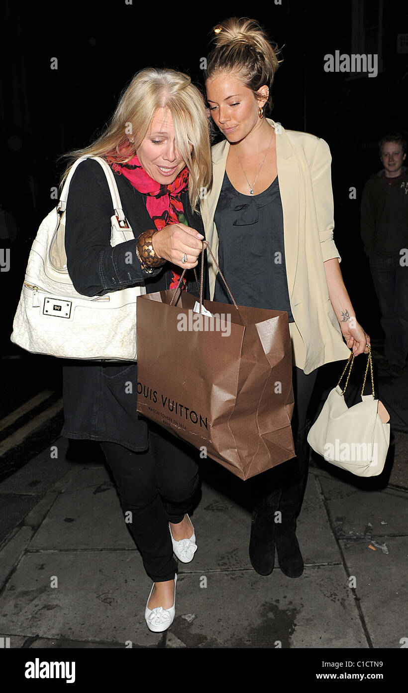 Sienna Miller and a female friend appear in high spirits as they leave ...